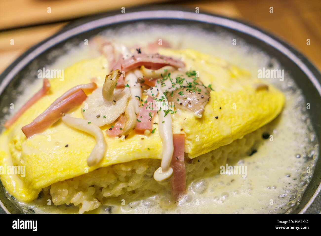 Rice with cheese omelet Stock Photo - Alamy