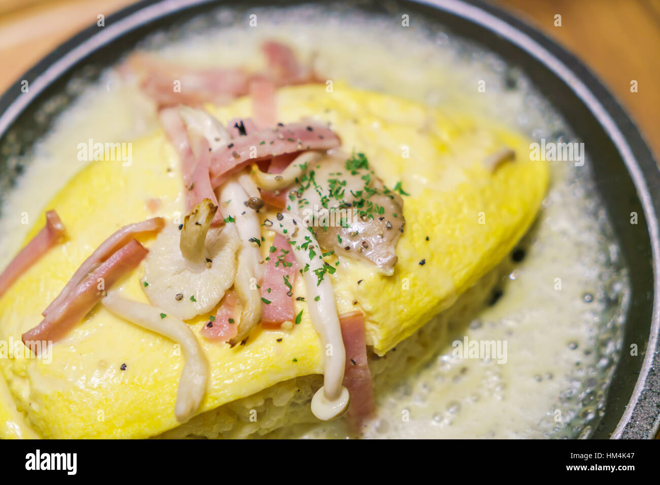 Rice with cheese omelet Stock Photo - Alamy