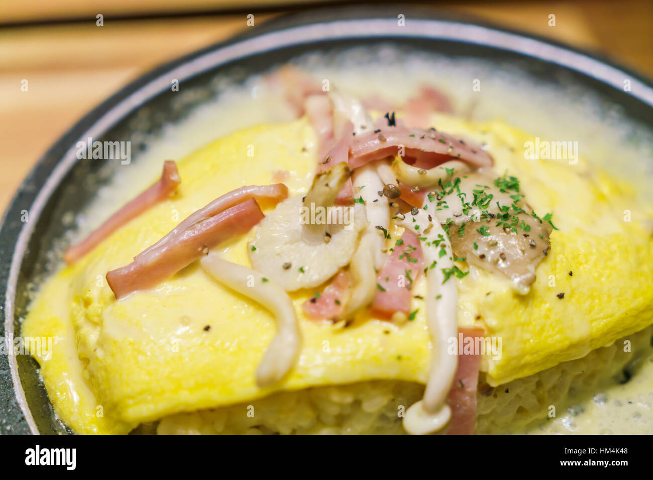 Rice with cheese omelet Stock Photo - Alamy