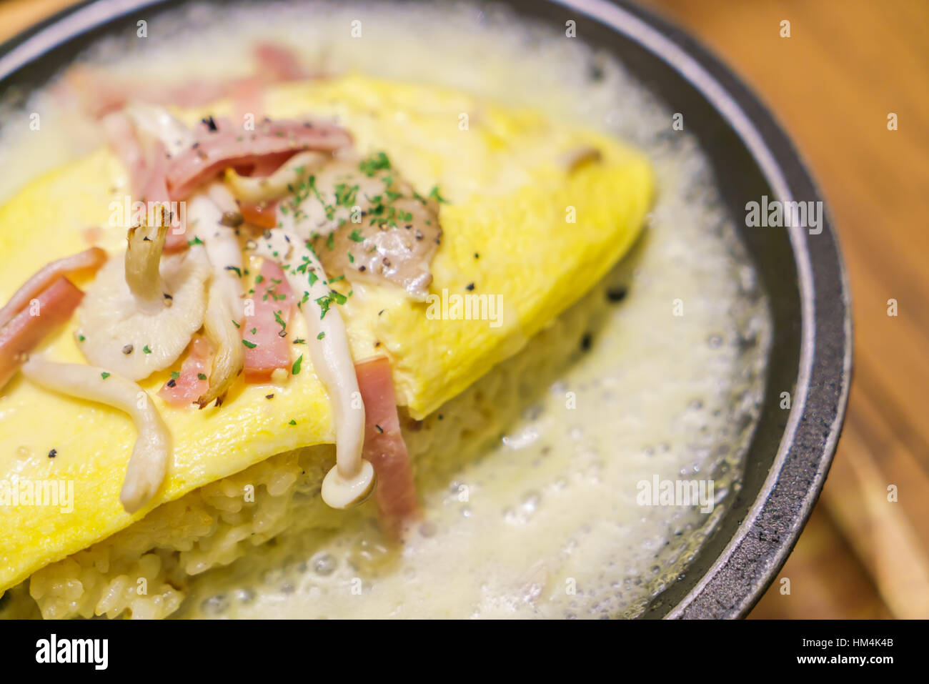 Rice with cheese omelet Stock Photo - Alamy