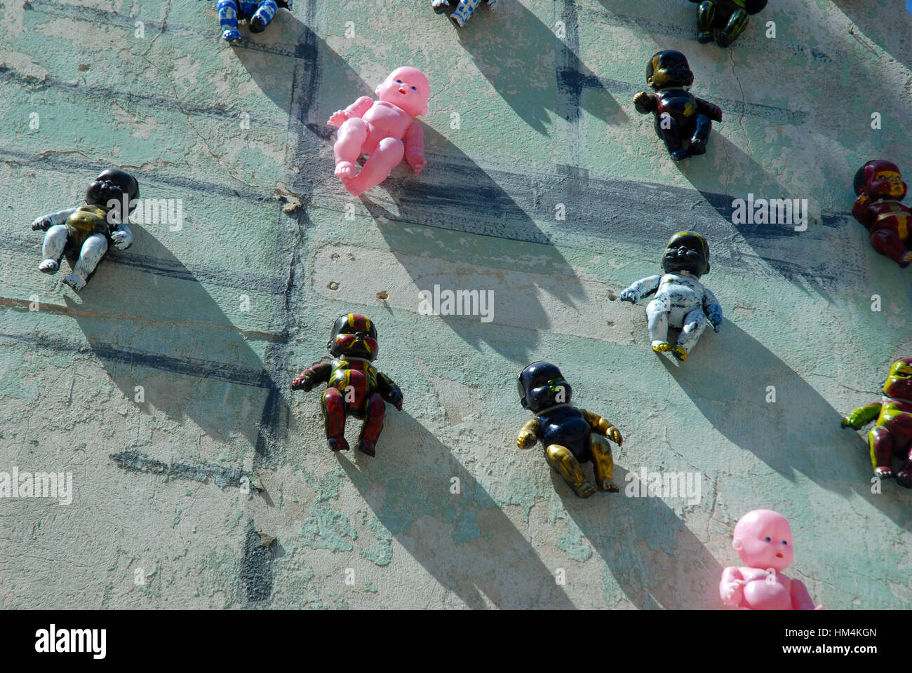 Colourful plastic babies on a wall, Havana, Cuba Stock Photo - Alamy