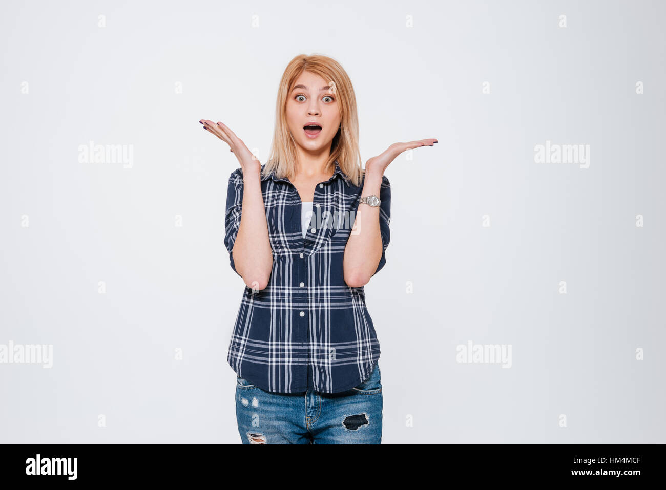 Image of a happy lady posing isolated on a white background. Looking at ...