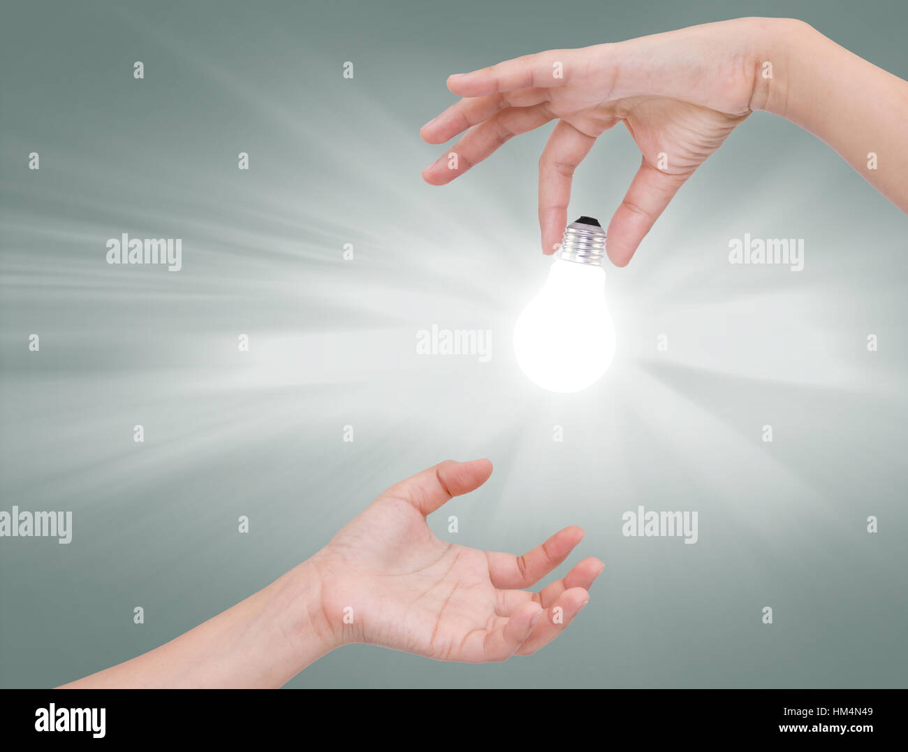 Women hand with lamp Stock Photo - Alamy