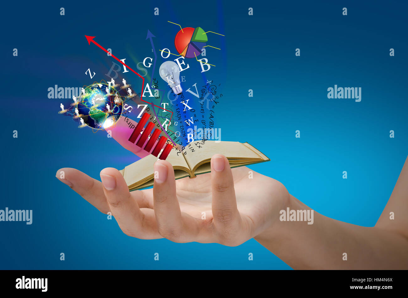 Magic book on hand Stock Photo - Alamy