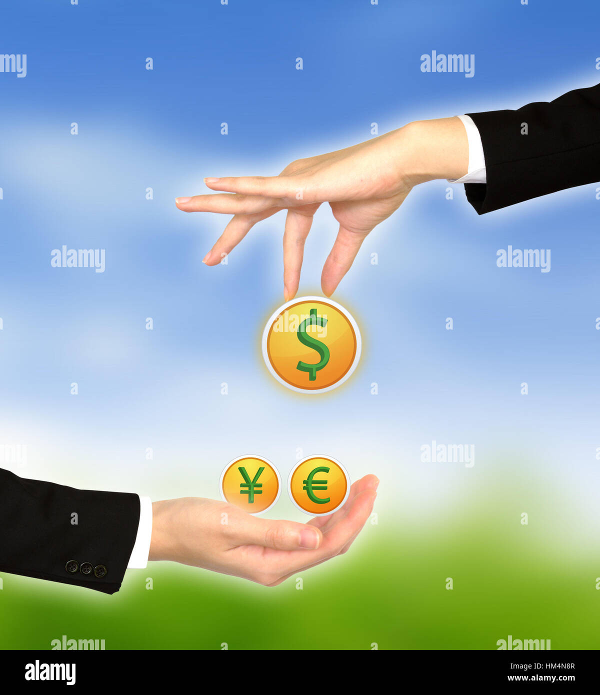 Hand bring up big euro sign Stock Photo - Alamy