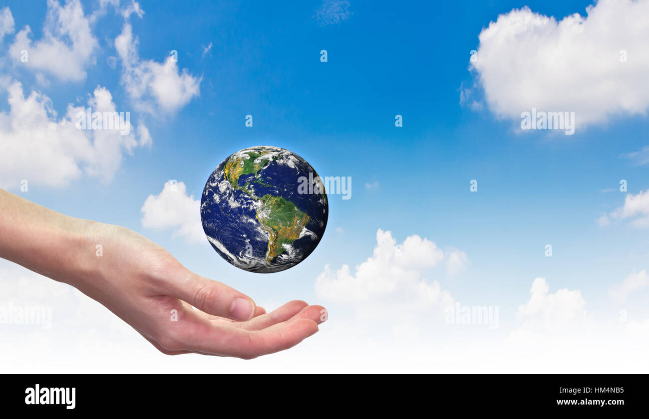 Earth on hand Stock Photo - Alamy