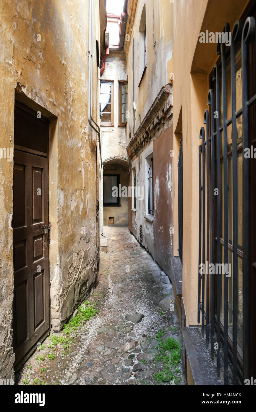 Narrow passage between buildings Stock Photo - Alamy