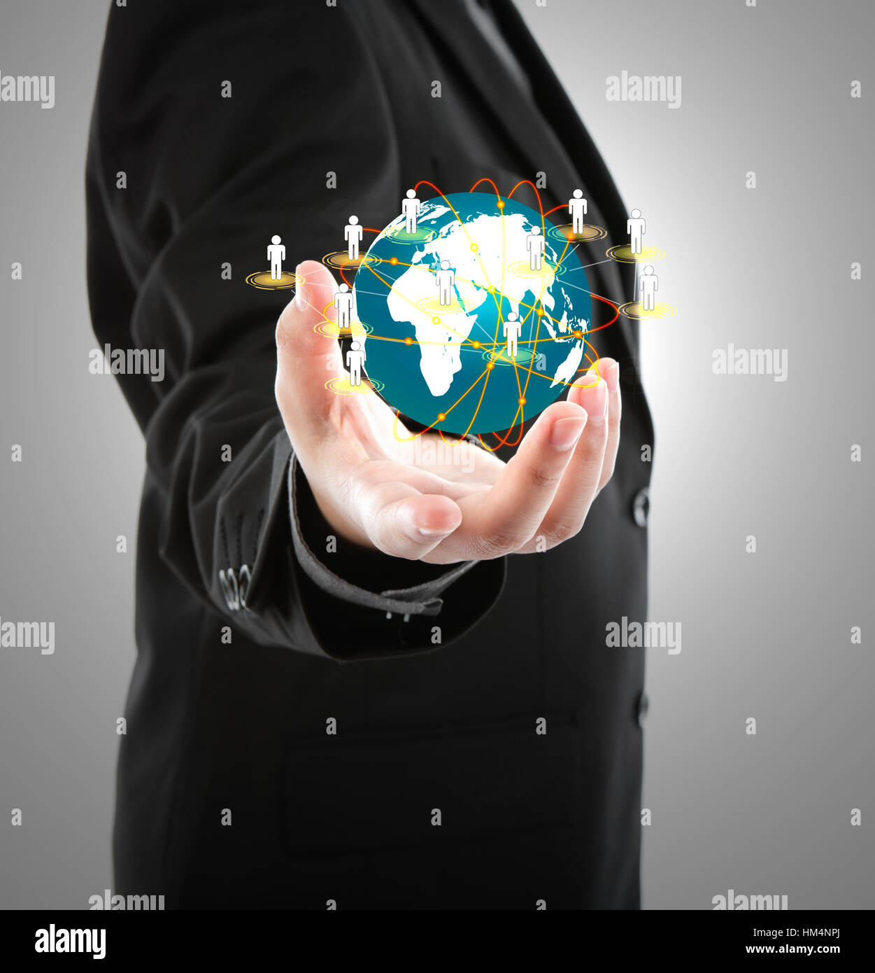 Business man holding the small world in his hands Stock Photo - Alamy