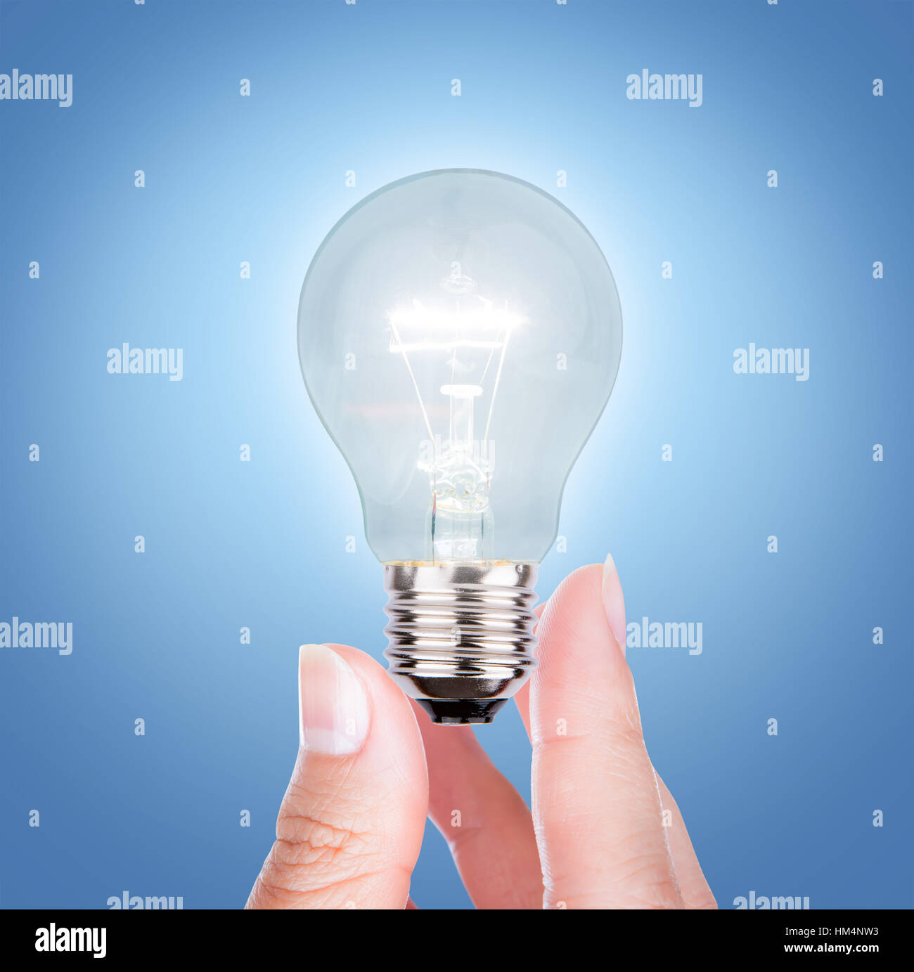 Hand with bulb Stock Photo - Alamy