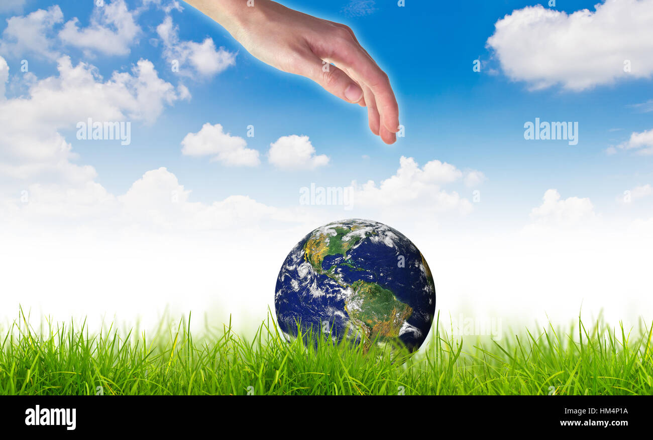 Earth on hand Stock Photo - Alamy