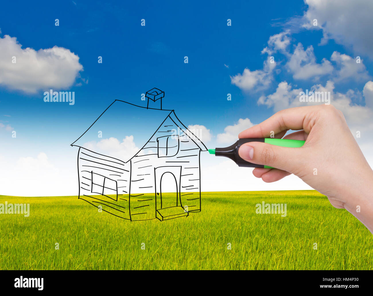 Business hand with pen drawing a house Stock Photo - Alamy