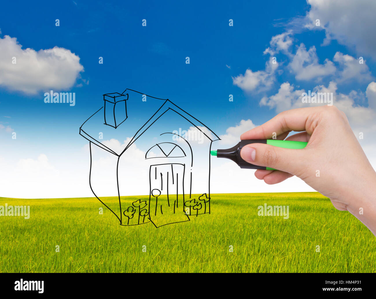 Business hand with pen drawing a house Stock Photo - Alamy