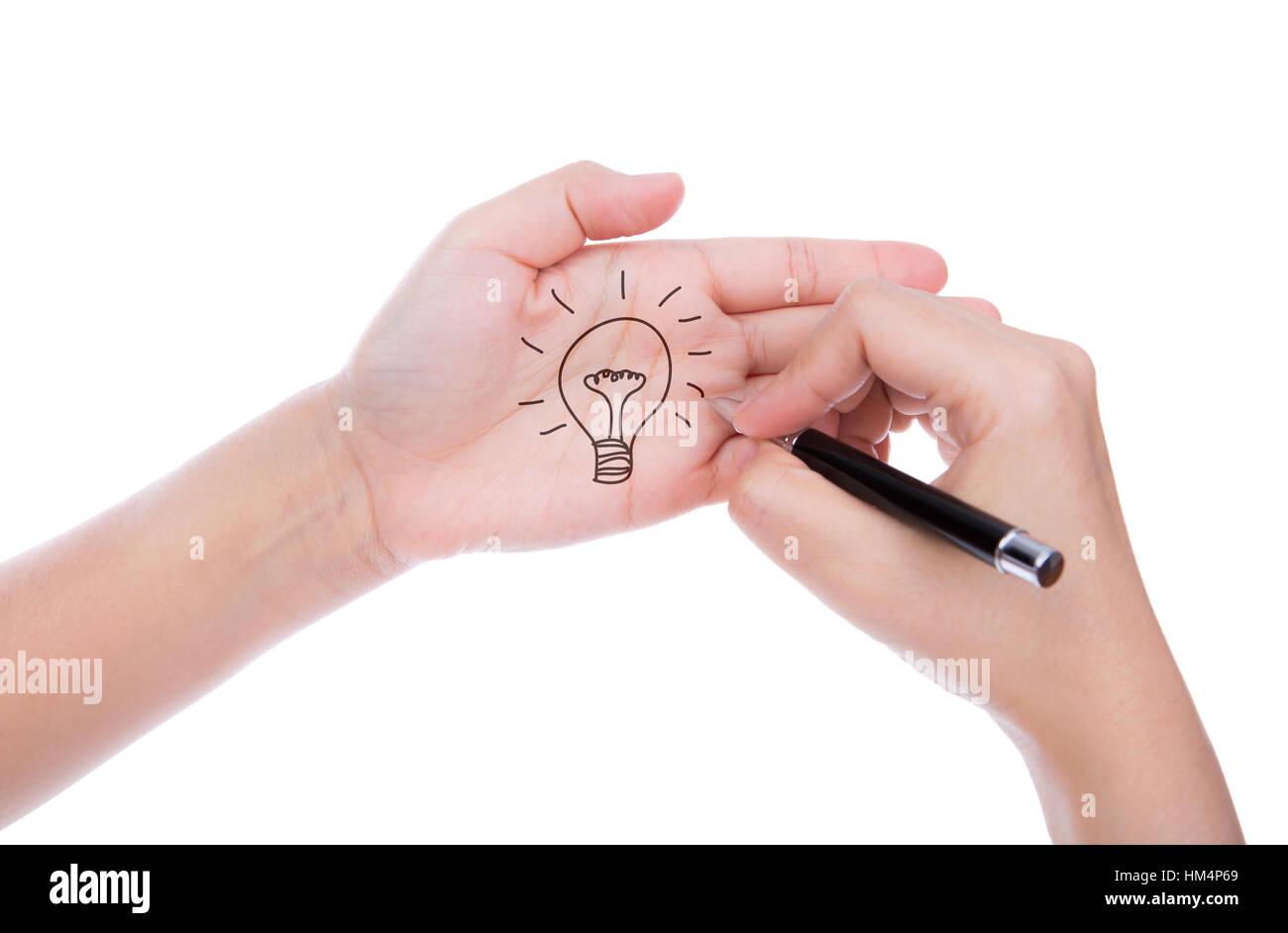 Hand with pen write idea light bulb isolated on white background Stock ...