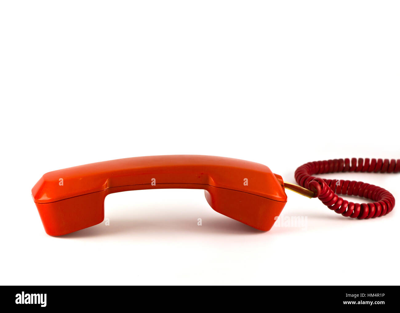 Old red phone isolated on white background Stock Photo - Alamy