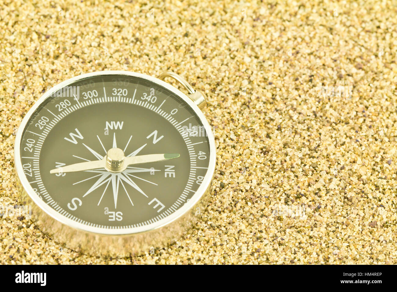 compass in sand Stock Photo - Alamy