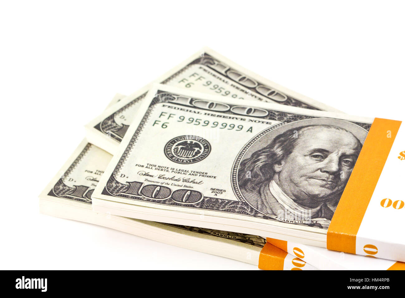 Ten thousand dollar stacks on the white Stock Photo - Alamy