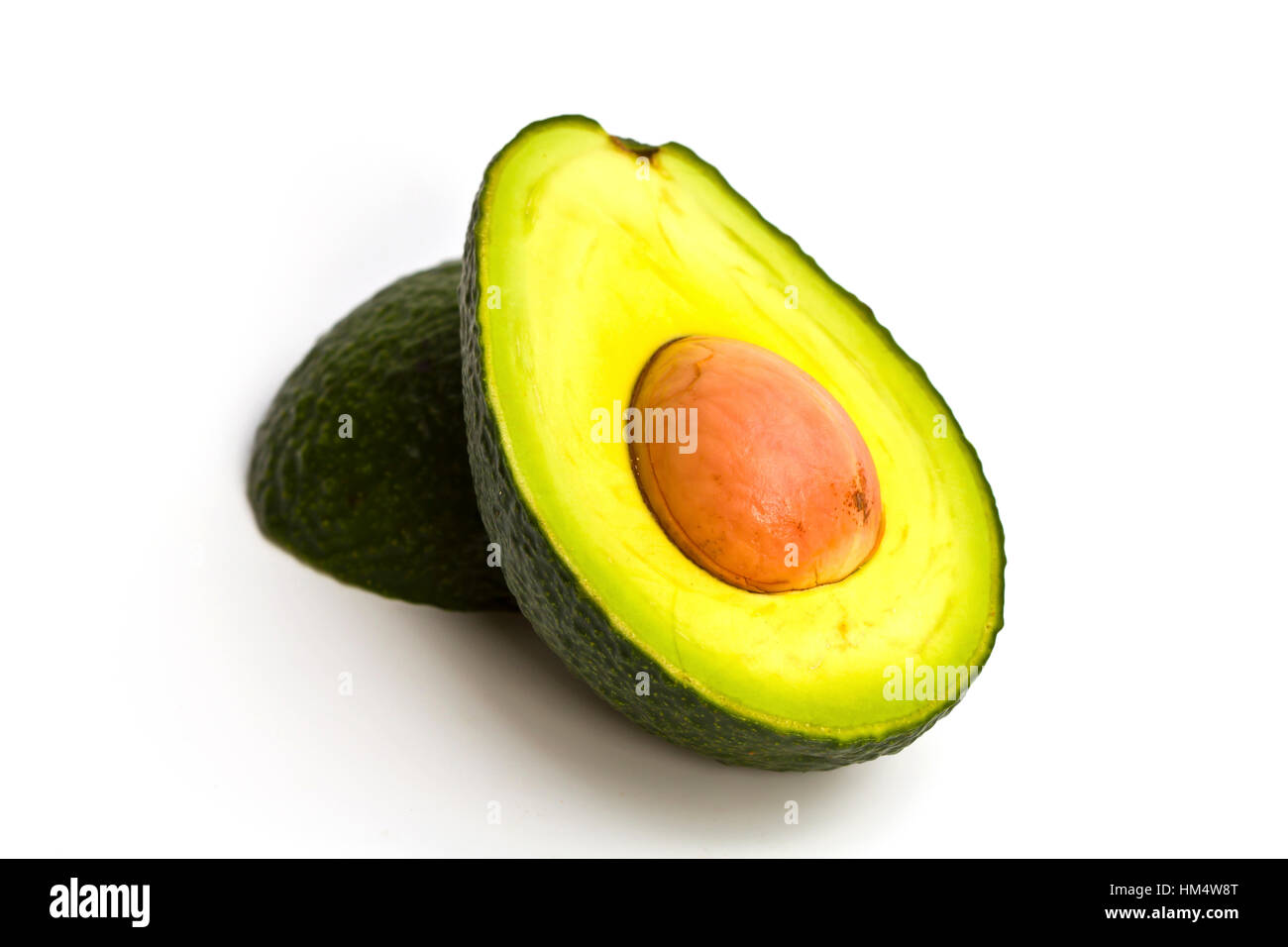 Organic Avocado on white background Stock Photo - Alamy
