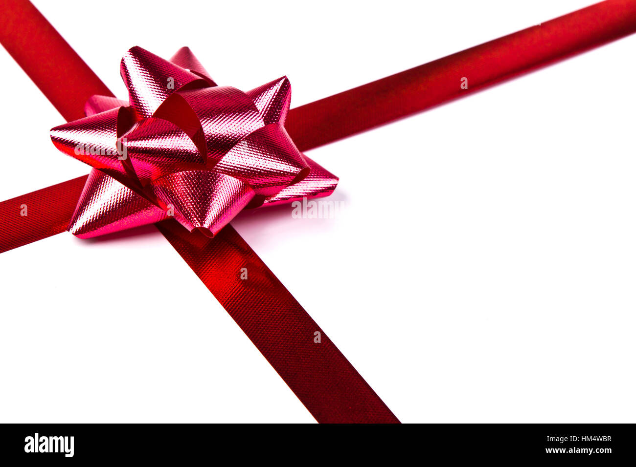 Bright red bow isolated over white background Stock Photo - Alamy