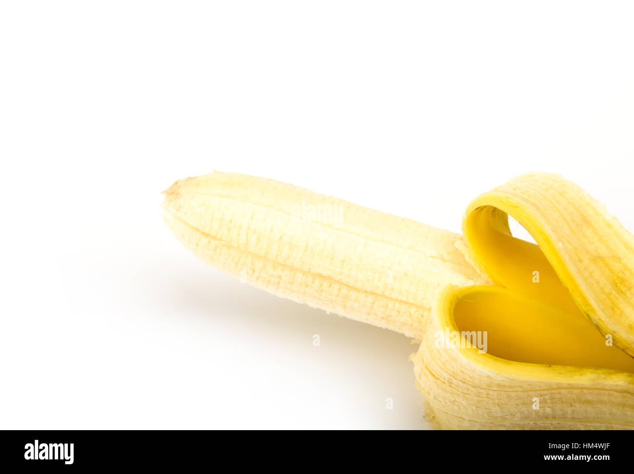 Open banana isolated on white background Stock Photo - Alamy