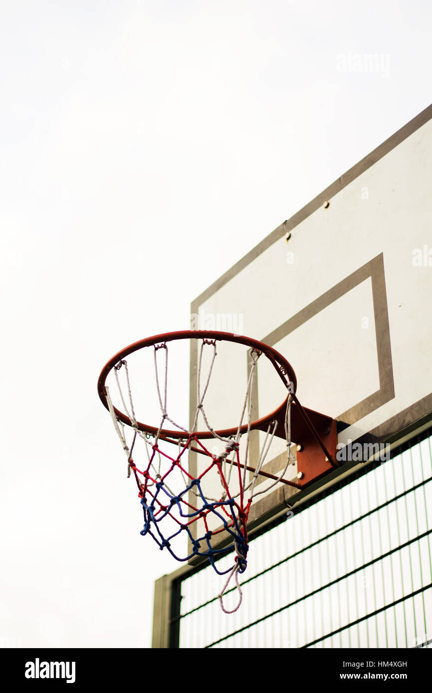 Basketball hoop outside in a school play area Stock Photo - Alamy