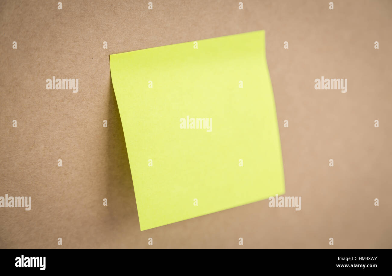 Sticky note on board Stock Photo - Alamy