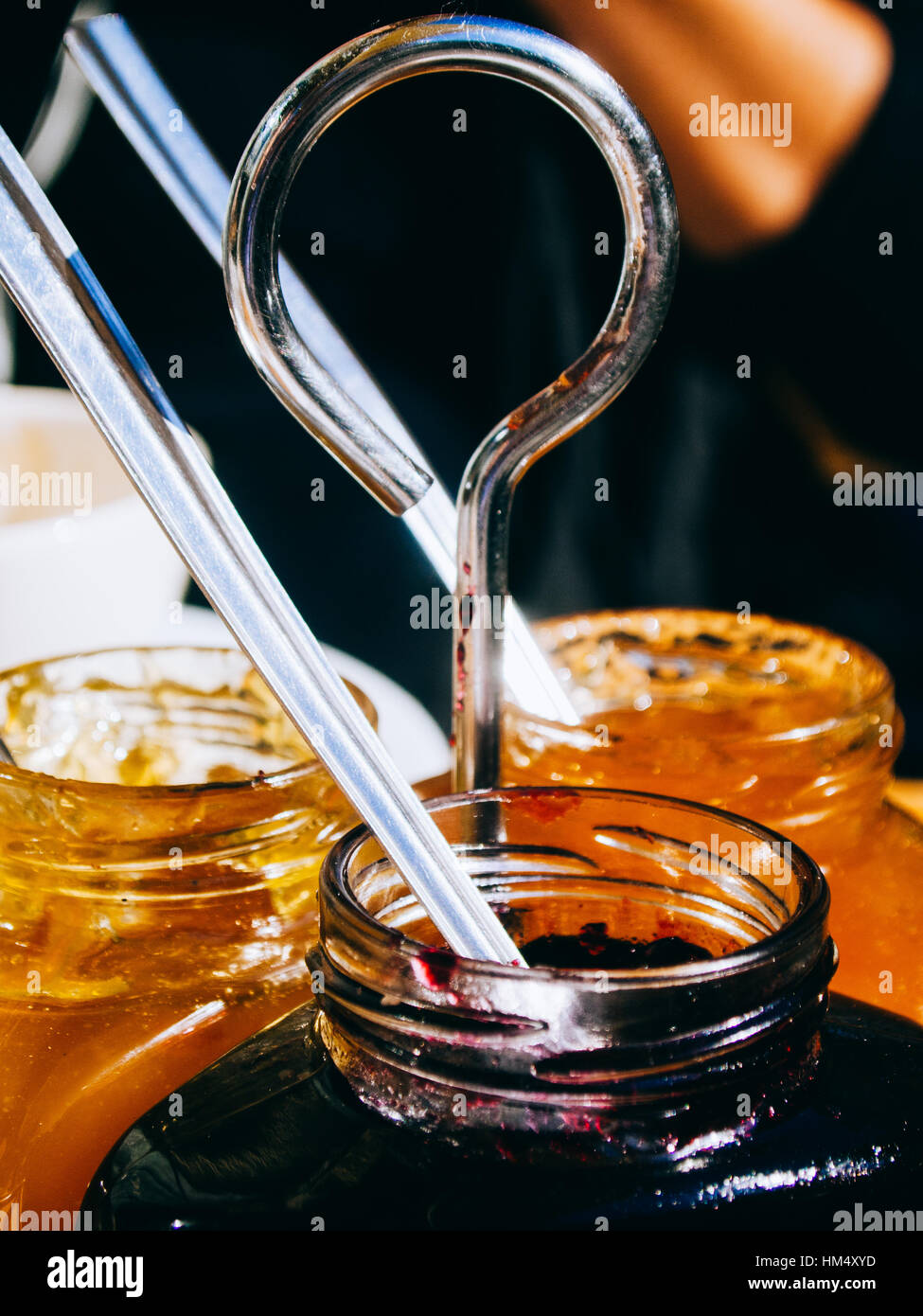 Close up of jam open with a spoon full Stock Photo - Alamy