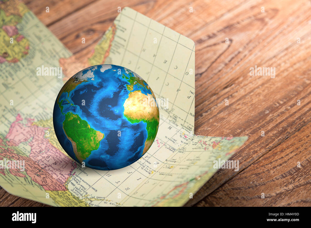 Earth in map on wood background Elements of this image furnished by ...