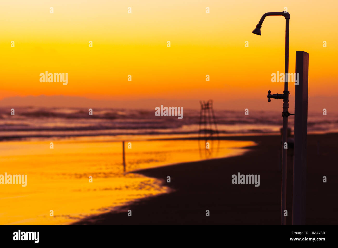 View of shower in the seaside resort at sunset Stock Photo - Alamy