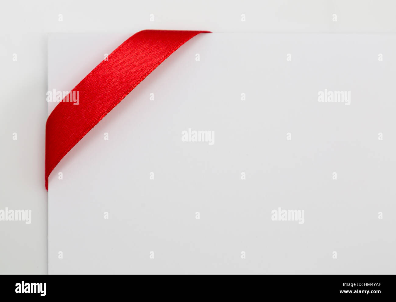 card notes with red ribbons Stock Photo - Alamy