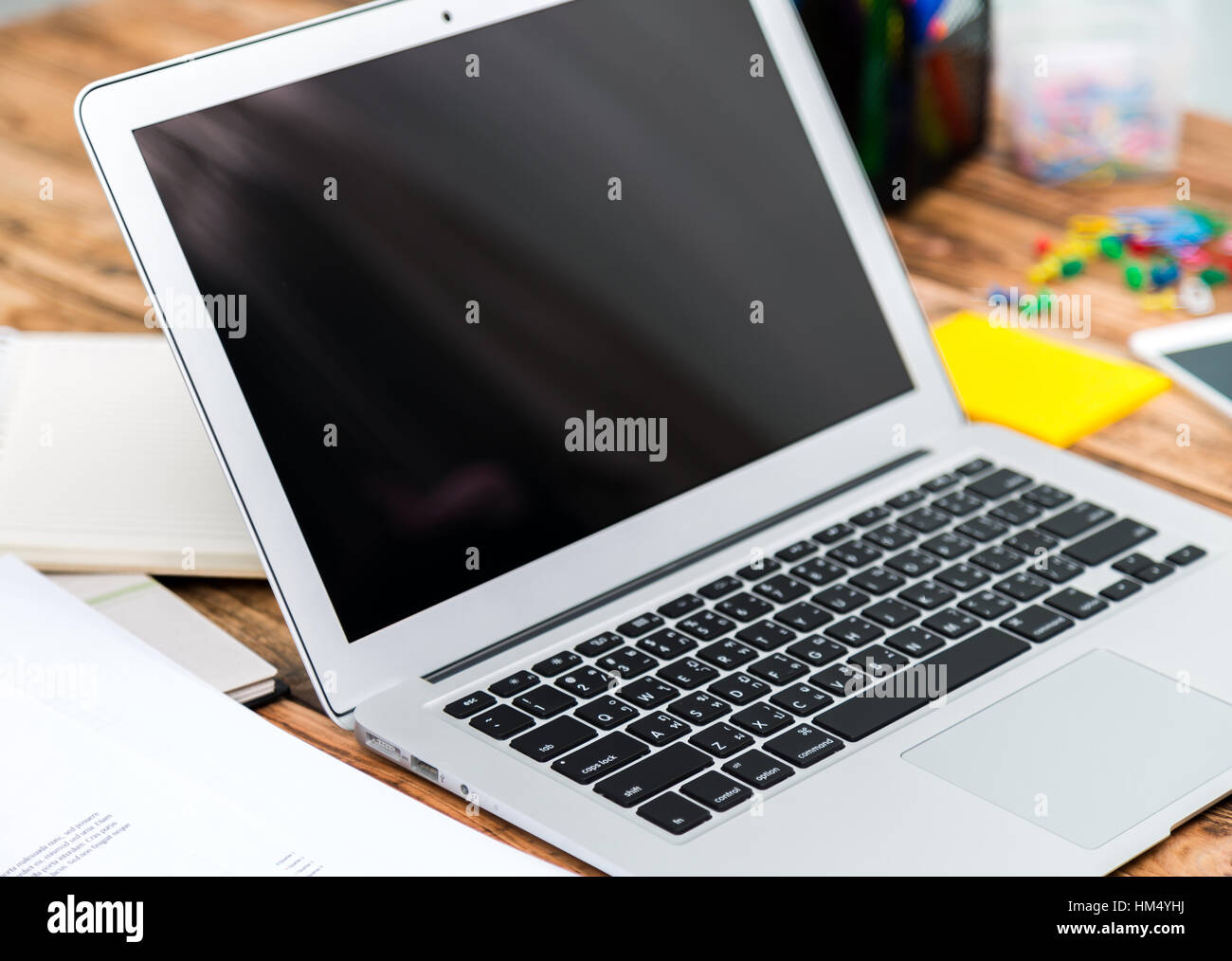 laptop computer on wood table Stock Photo - Alamy
