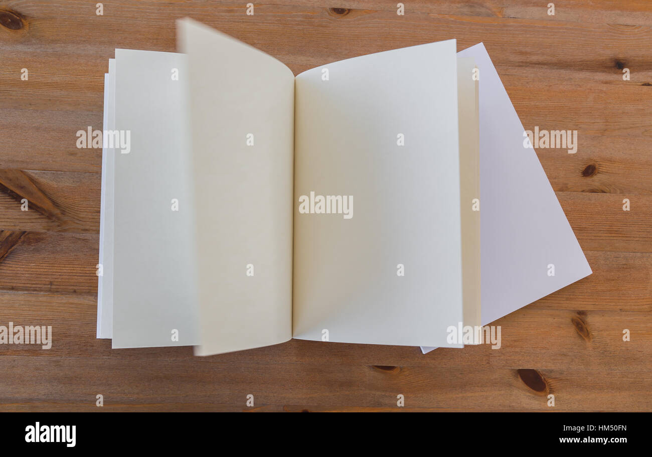 Blank catalog, magazines,book mock up on wood background ( moving page ...