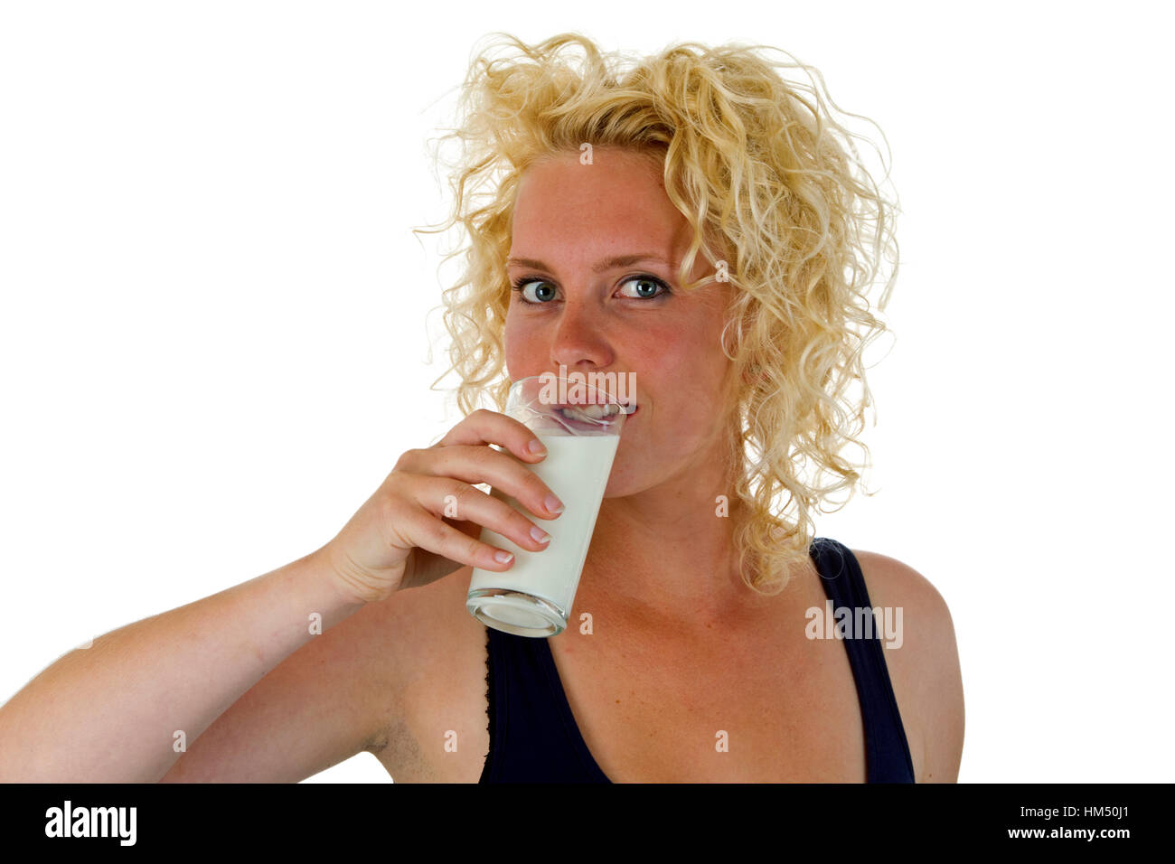 Young woman drinking fresh milk - isolated on white background Stock ...