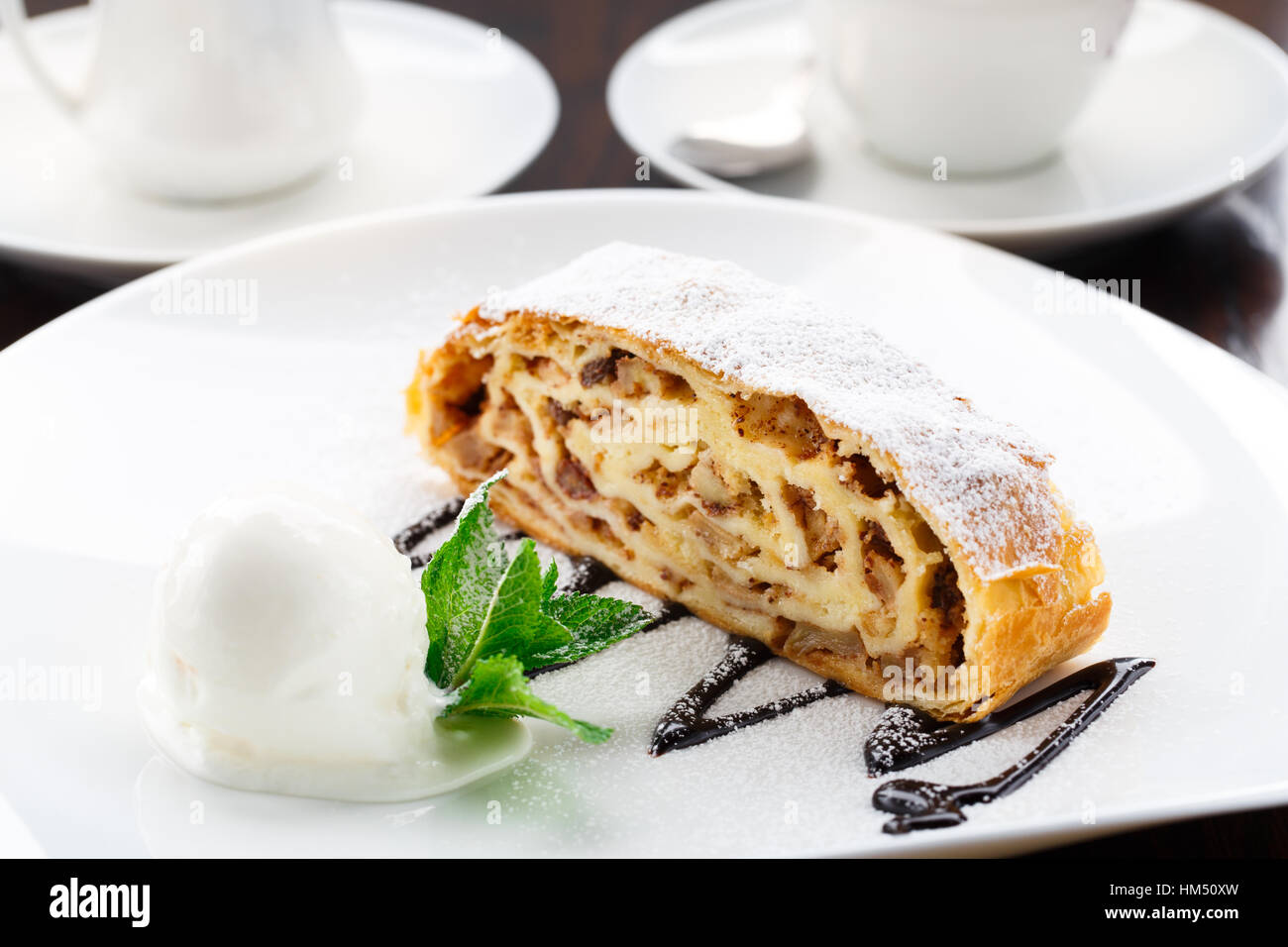Apple strudel with vanilla ice cream Stock Photo - Alamy