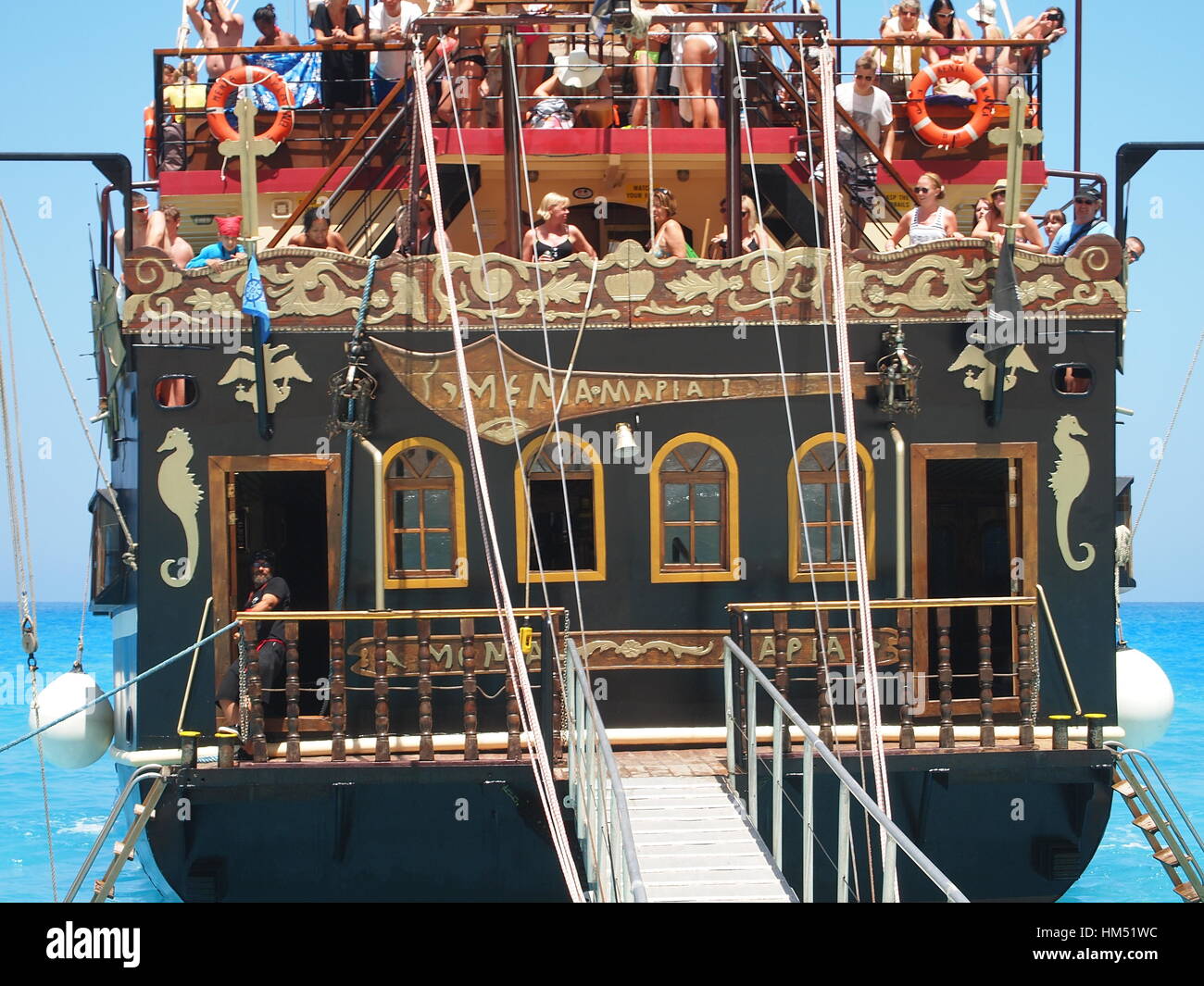 Pirate ship with tourists at Shipwreak beach. The most beautiful beach ...