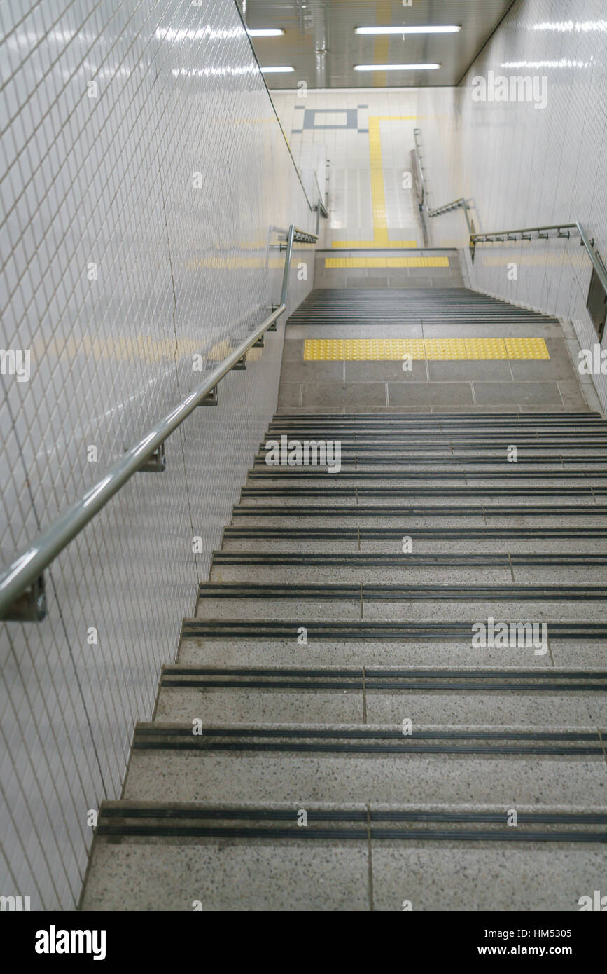 Staircase in subway station Stock Photo - Alamy