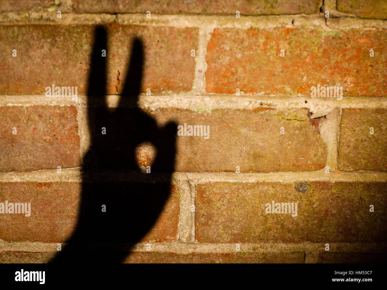 Man's shadow wall hi-res stock photography and images - Alamy