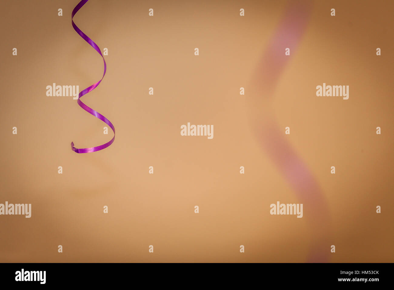 Party ribbon hanging down from a balloon Stock Photo - Alamy