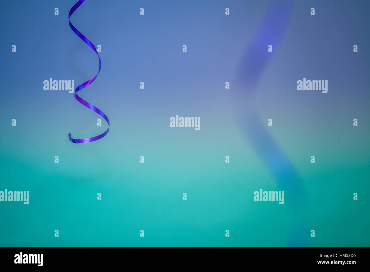 Hanging from a ribbon hi-res stock photography and images - Alamy