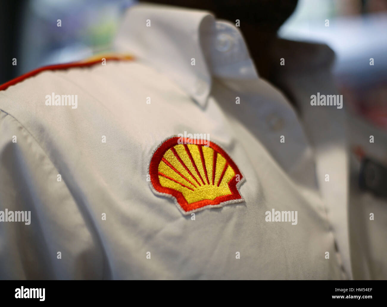 File photo dated 08/04/15 of a Shell logo on the shirt of a member of ...