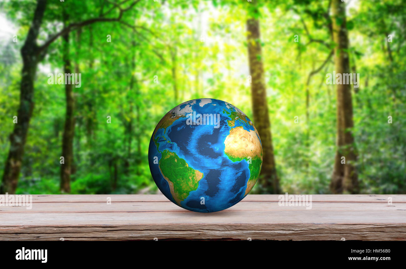 Earth on wood table (Elements of this image furnished by NASA Stock ...