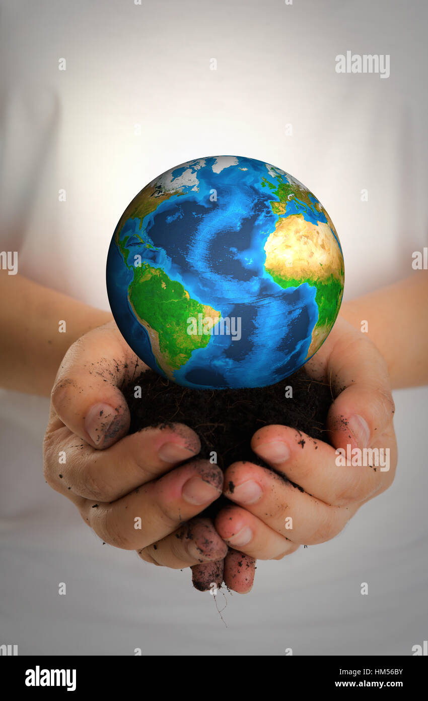 Hands with earth (Elements of this image furnished by NASA Stock Photo ...