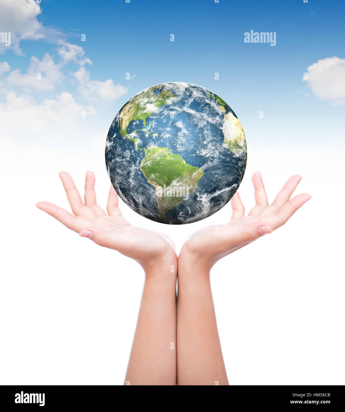Hands with earth (Elements of this image furnished by NASA Stock Photo ...