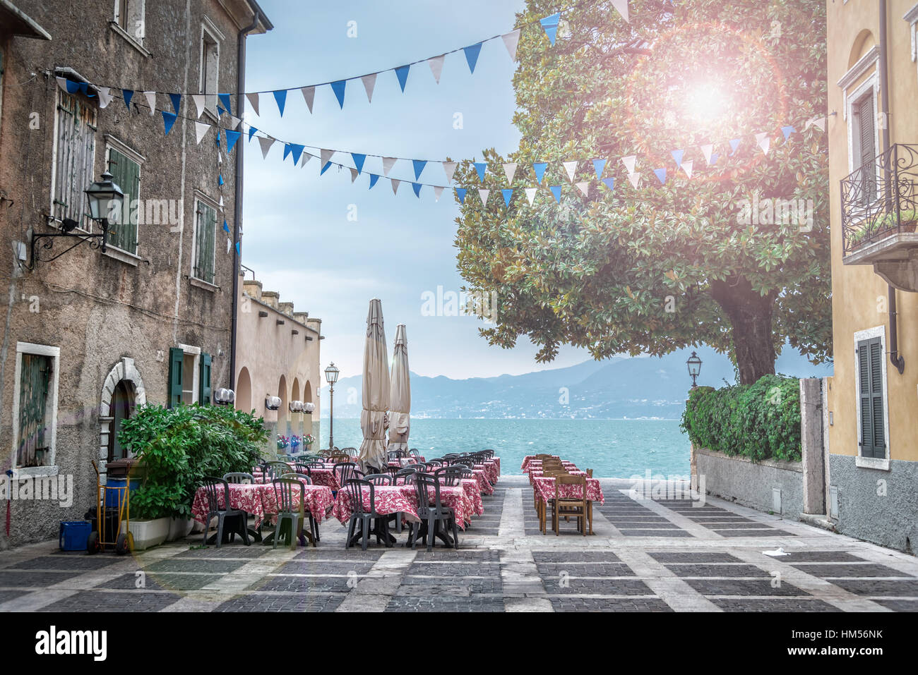 Summer cafe on the beautiful lake Stock Photo - Alamy