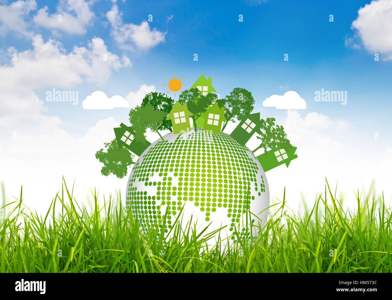 Environmentally friendly planet on green grass and blue sky Stock Photo ...
