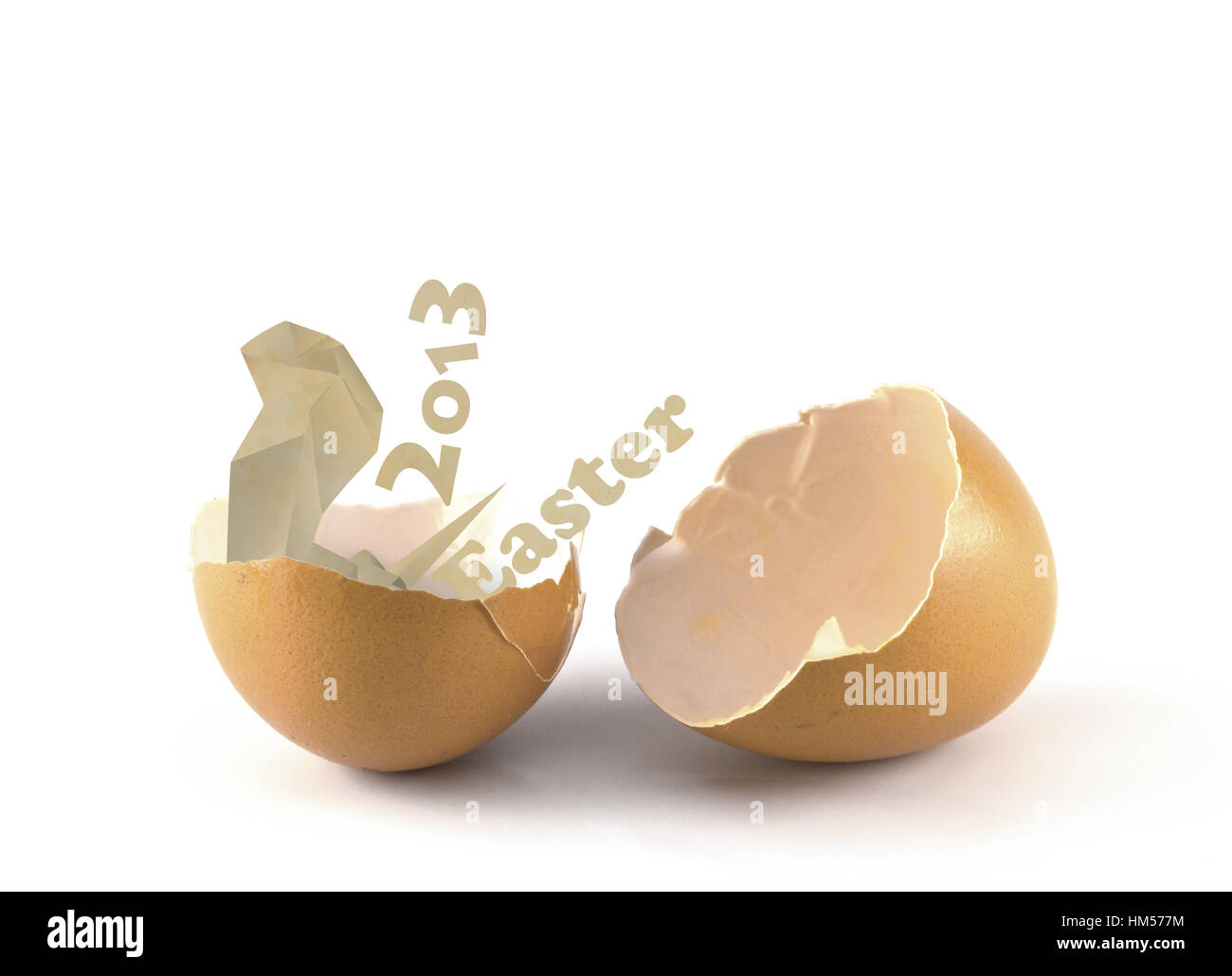 Broken egg and 2013 easter with paper snake Stock Photo - Alamy