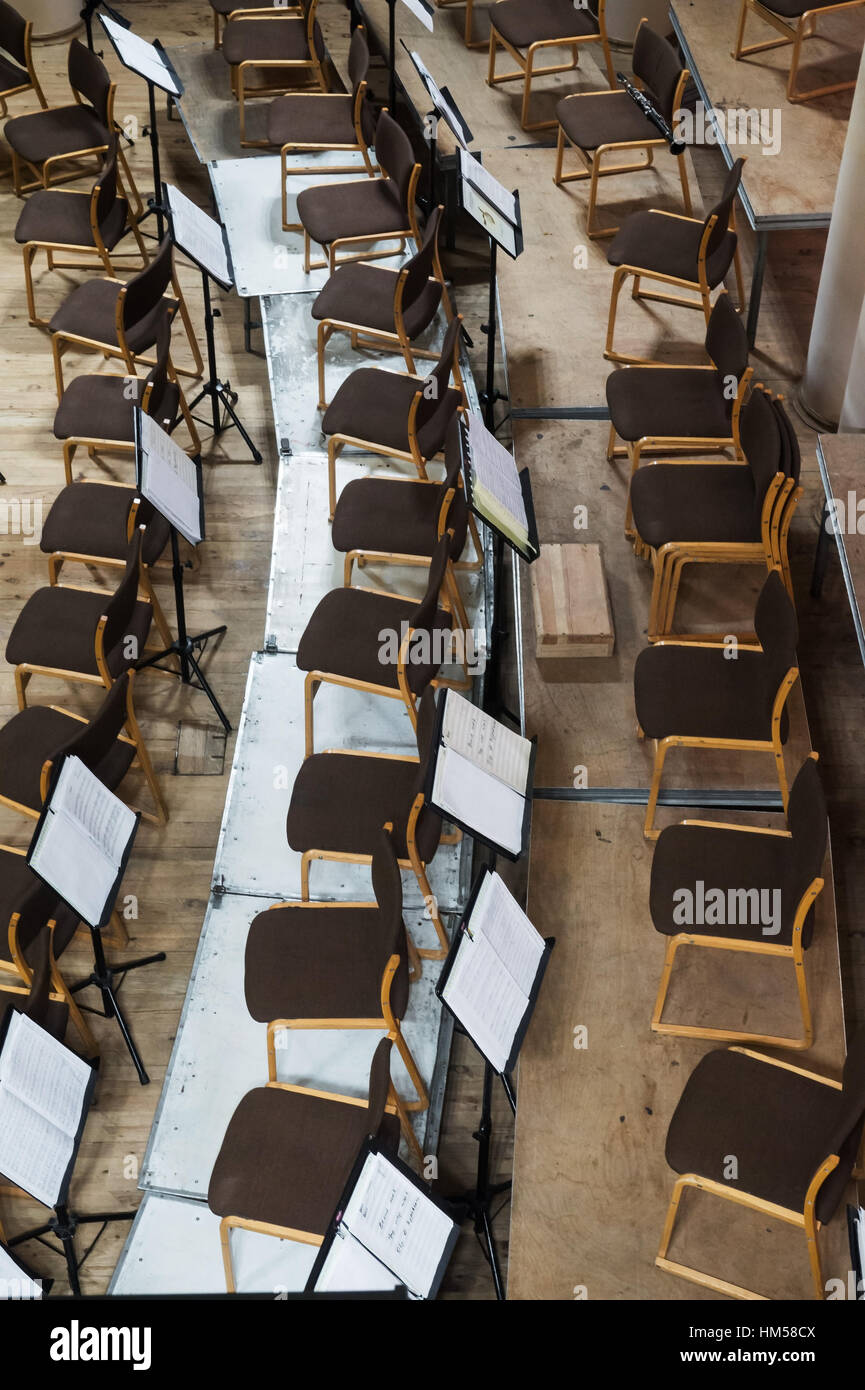 Empty stage with chairs and music stands before the concert. Arranged ...