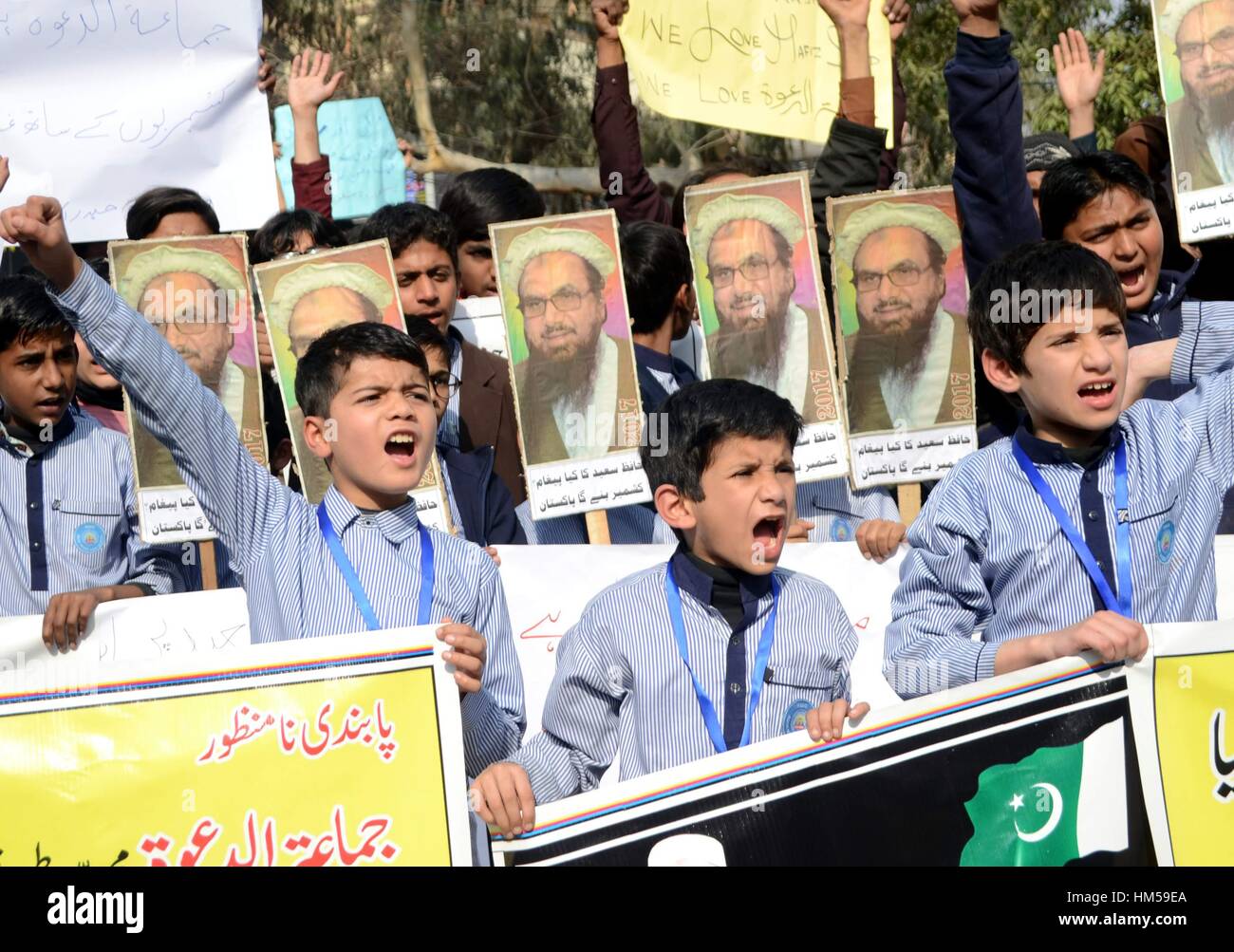 Hyderabad, Pakistan. 31st Jan, 2017. School boys shout during the ...