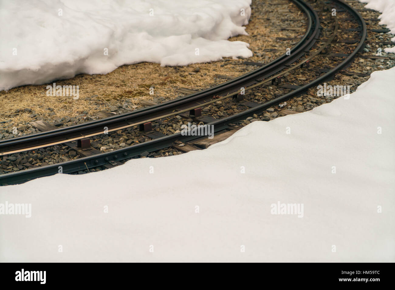 Railway track on snow Stock Photo - Alamy