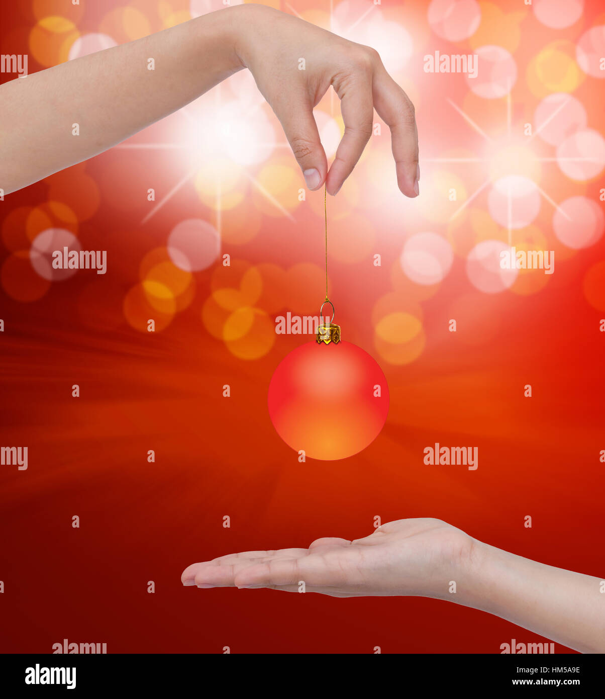 Human hand holding Transparent Christmas ball Stock Photo - Alamy