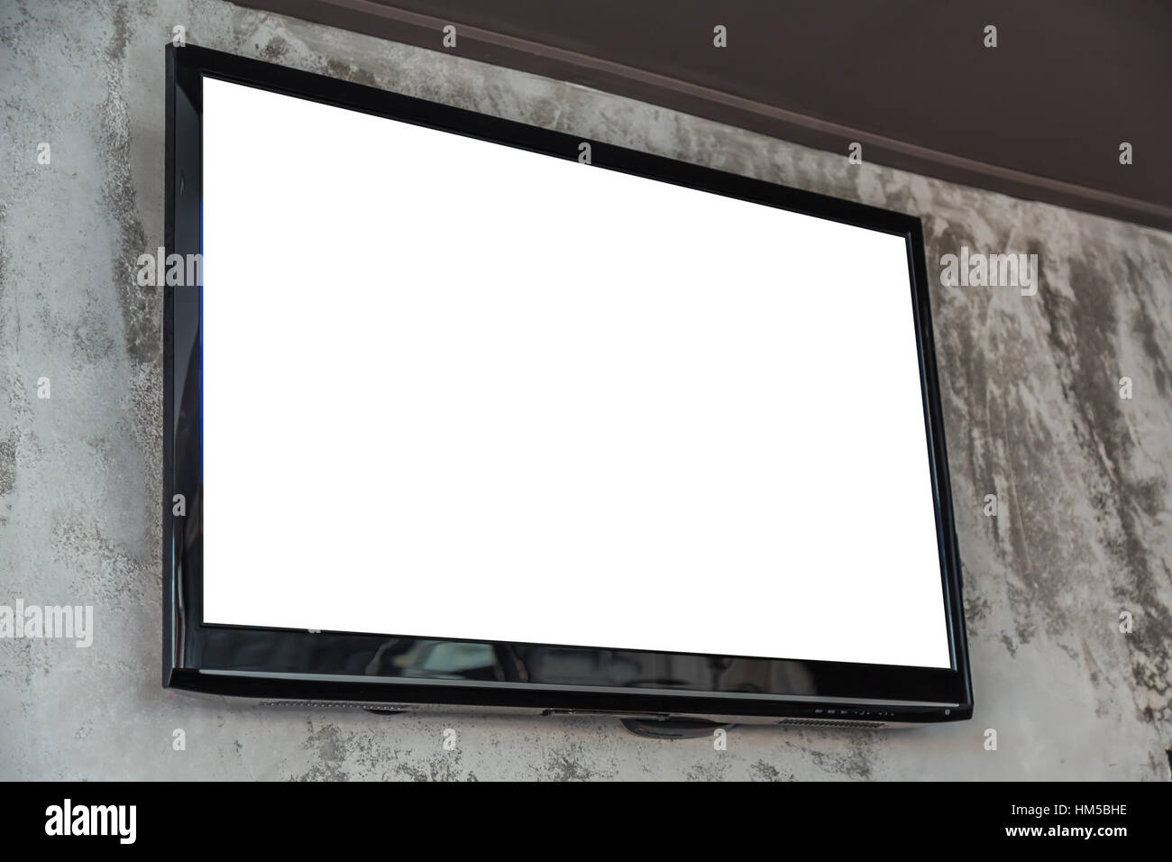TV screen on wall Stock Photo - Alamy